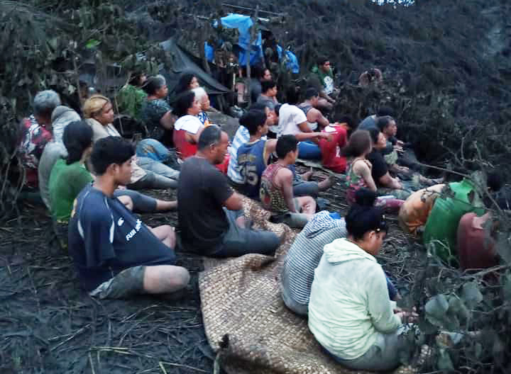 Island decimated by tsunami: Photos show emotional gathering of Mango ...